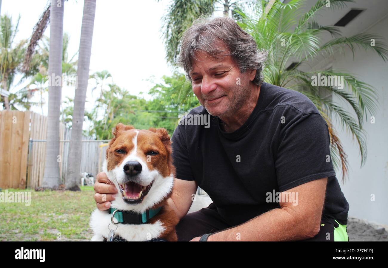 Man about dog hi-res stock photography and images - Alamy