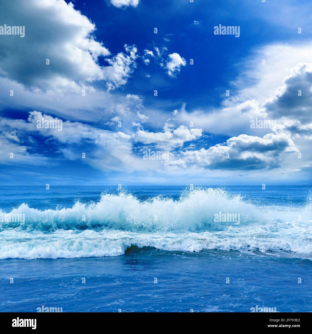 Bright ocean landscape in blue tones. Sea waves and beautiful sky with ...