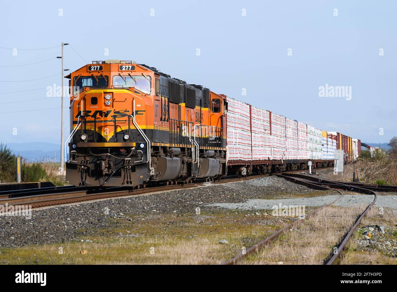 Southbound morning BNSF freight train at Stanwood Washington with track ...