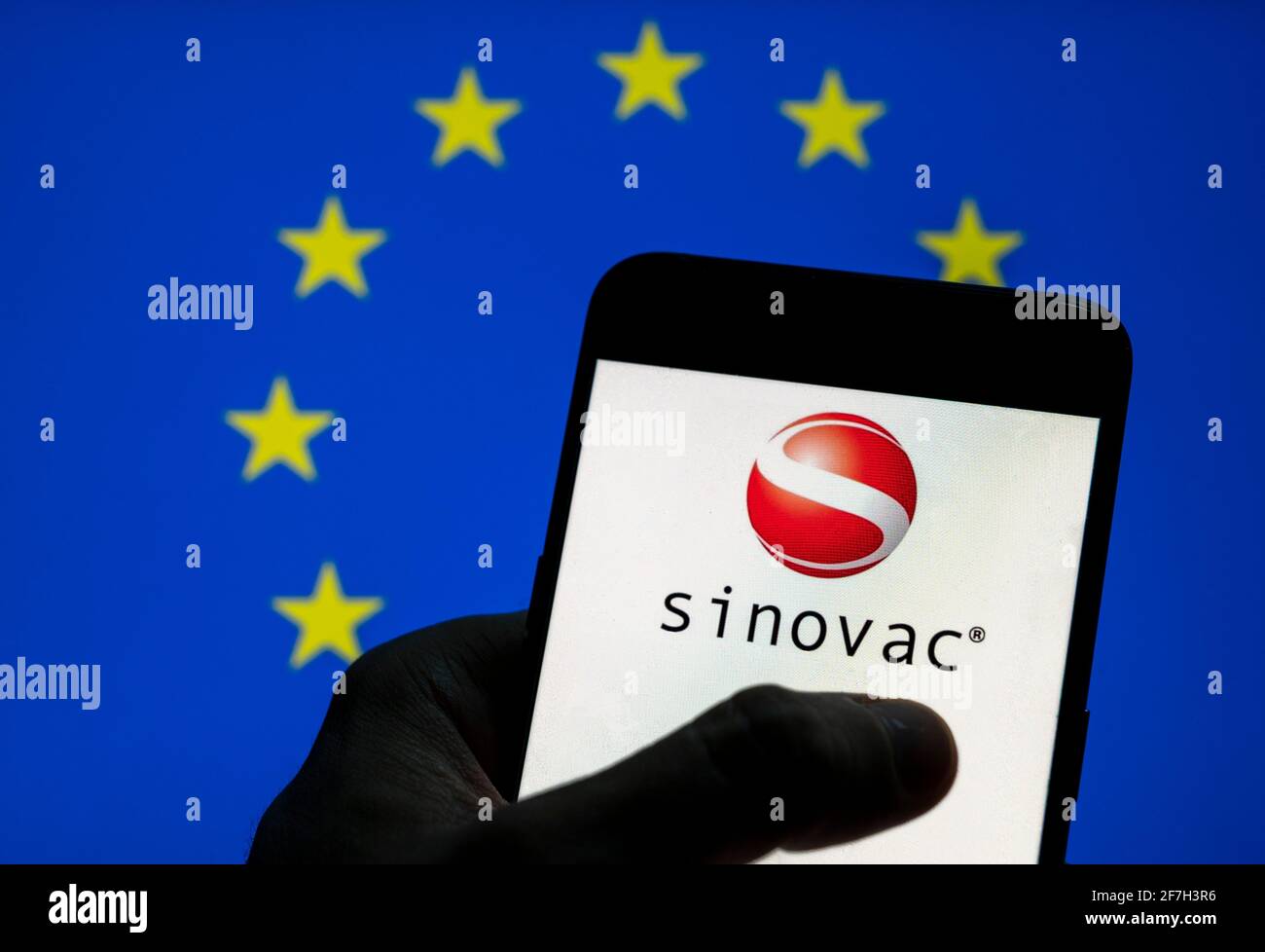 In this photo illustration the Chinese Sinovac vaccine logo for Covid ...