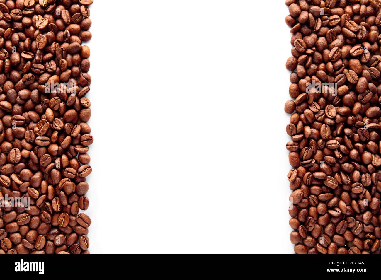 Coffee beans background on white background Stock Photo - Alamy