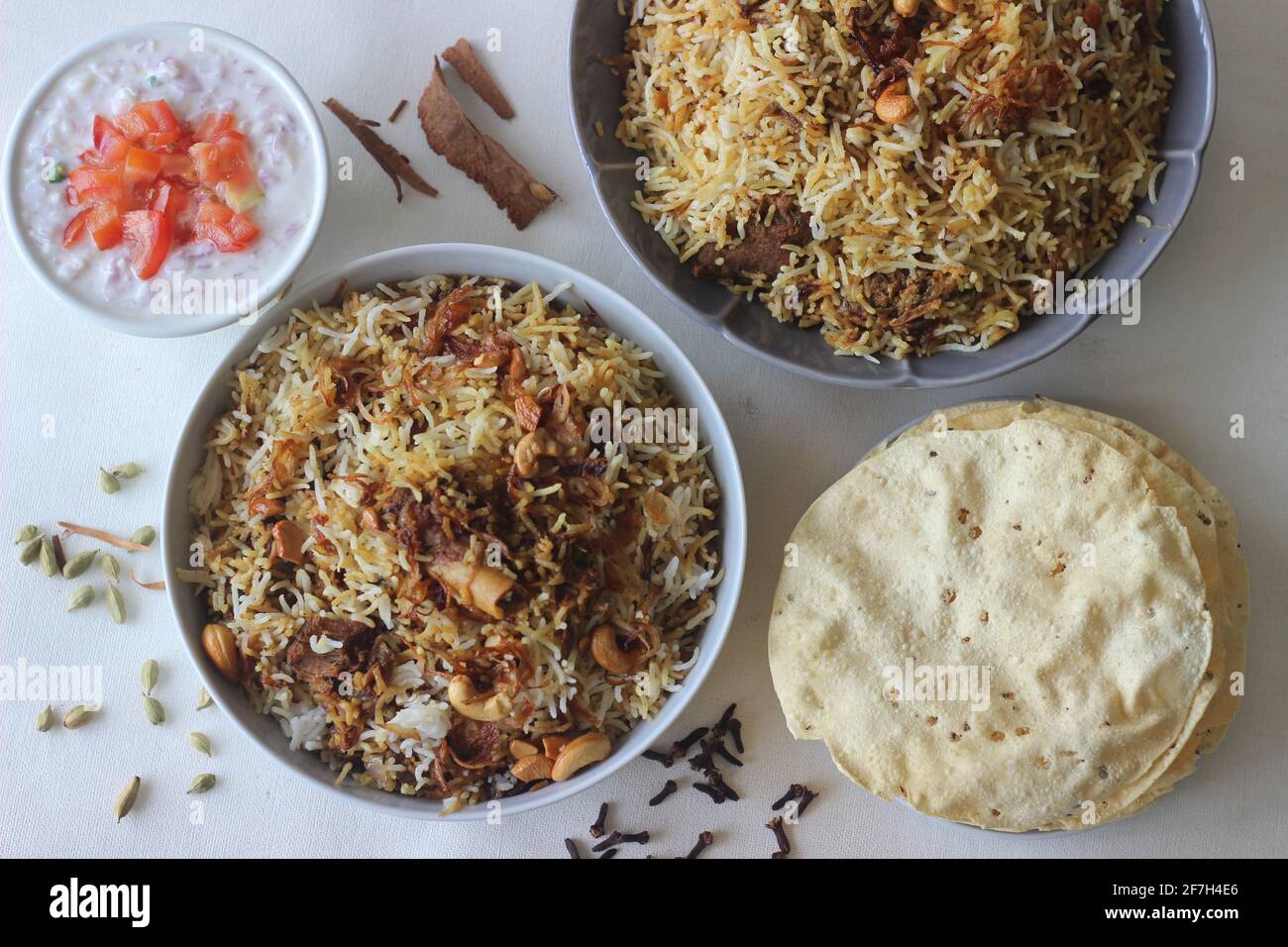 Mutton Biryani. A dish cooked with spices layered between mildly spiced ...