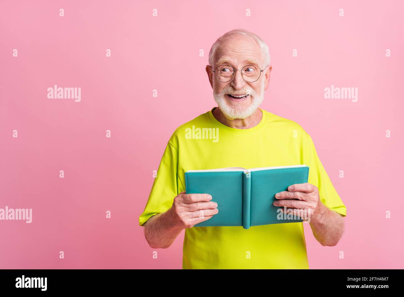 Portrait of cunning pensioner read copybook look empty space wear ...