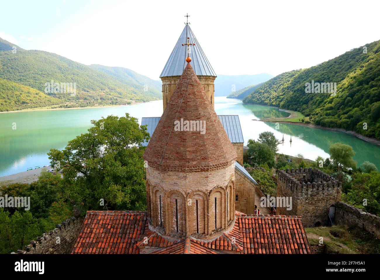Two of Medieval Churches in Ananuri Fortress Against the Emeral Green ...