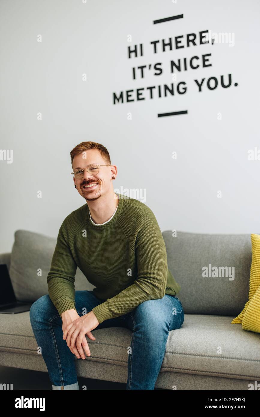 Successful freelancer on sofa hi-res stock photography and images - Alamy