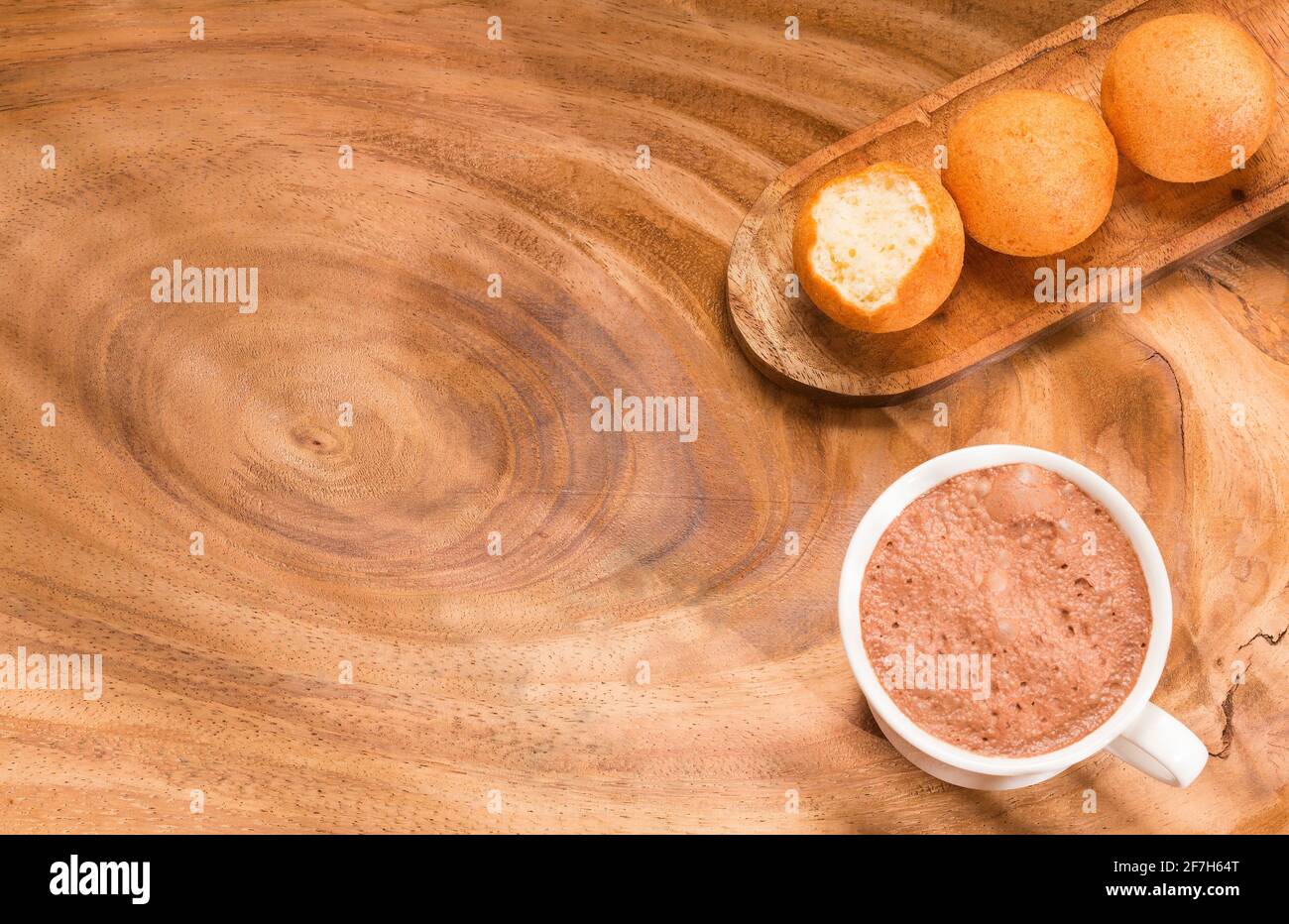 Traditional Colombian buñuelo - Deep Fried Cheese Bread. Hot chocolate ...