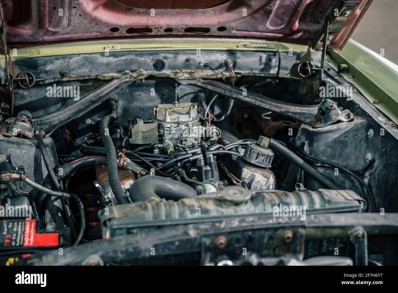 Vintage V8 american muscle car engine bay, worn but still good. Focus ...