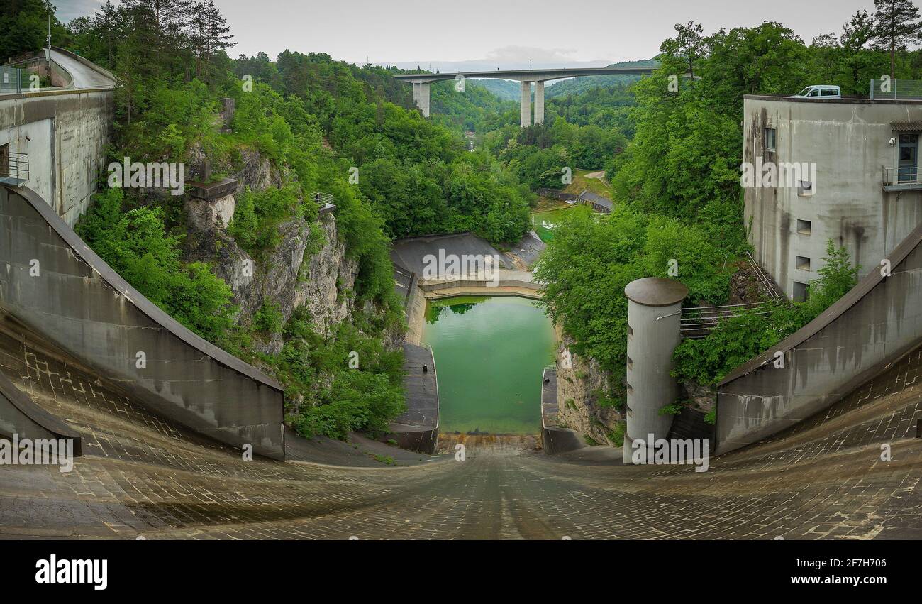 Scary view from small but steep dam for hydroelectric plant in Moste ...