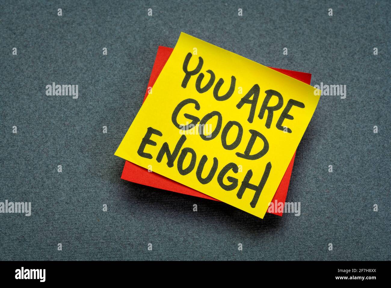 you are good enough inspirational concept - handwriting in black ink on ...