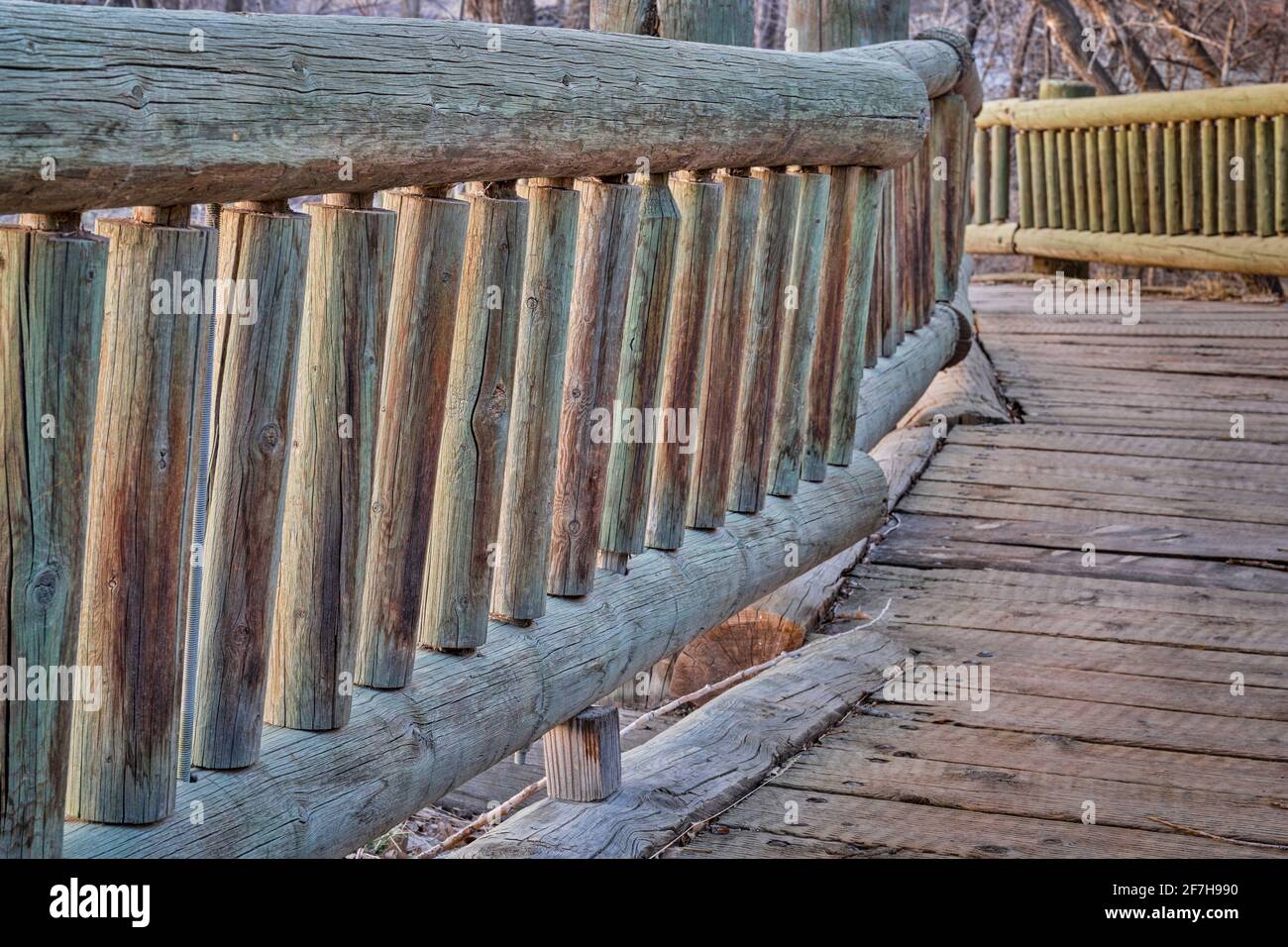 nature trail - wooden boardwalk with log rails - invitation for walking ...