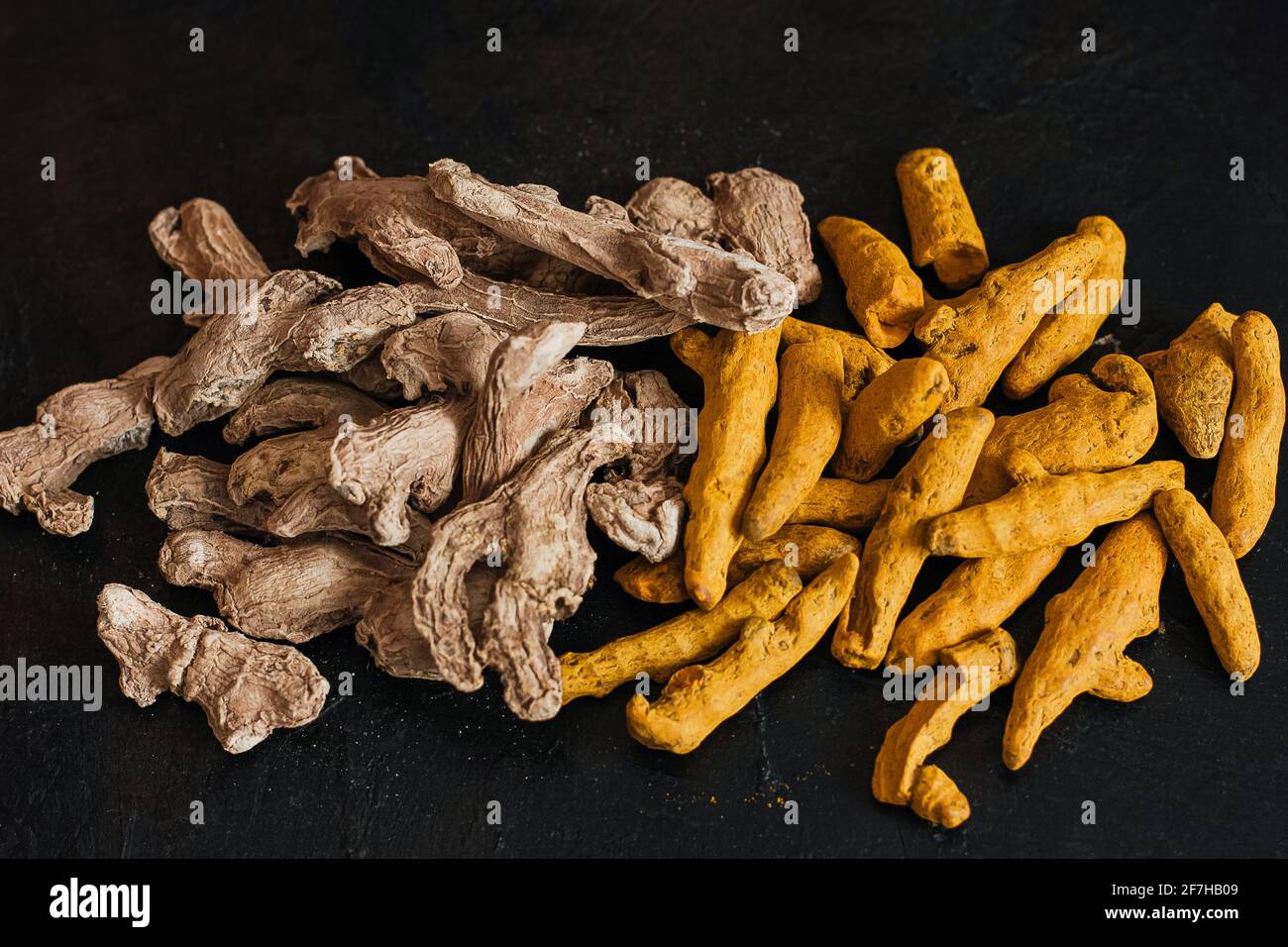 Fresh tumeric roots and powder is a spice that supports your body ...