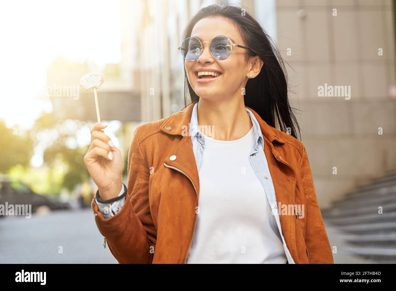 Young lady walking hi-res stock photography and images - Alamy