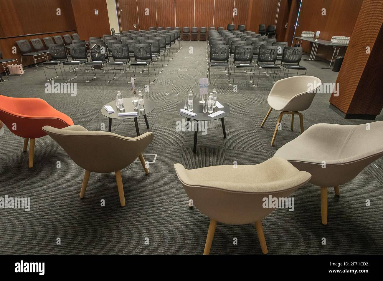 Empty chairs for a conference round table in an empty conference hall ...