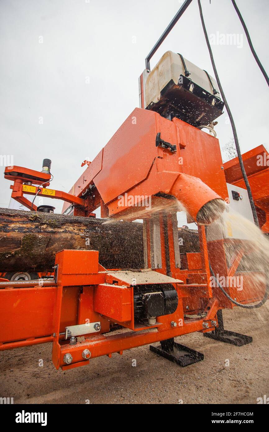 Sawing machine processing timber material hi-res stock photography and ...