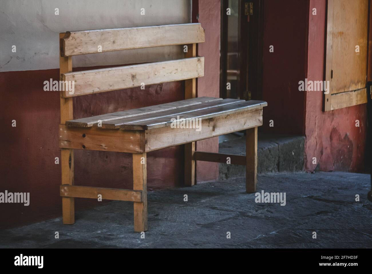 An old wooden bench on a paved street in Oaxaca, Mexico Stock Photo - Alamy