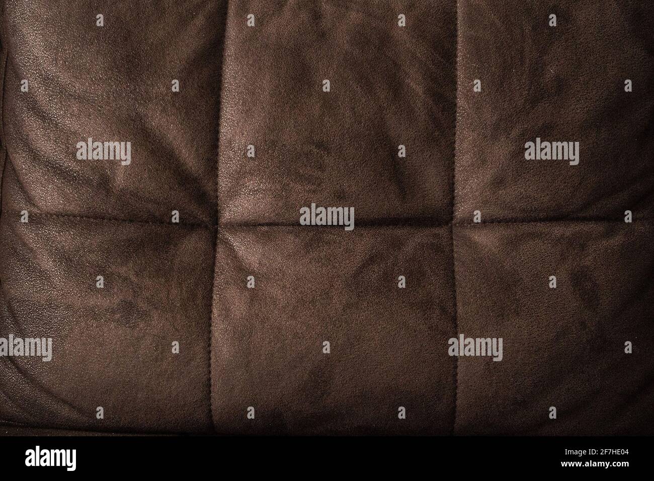 Texture of a couch headrest made out of brown leather Stock Photo - Alamy