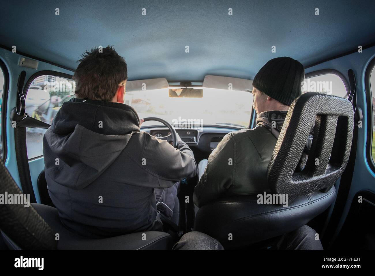 Driving a car from the back seat hi-res stock photography and images ...