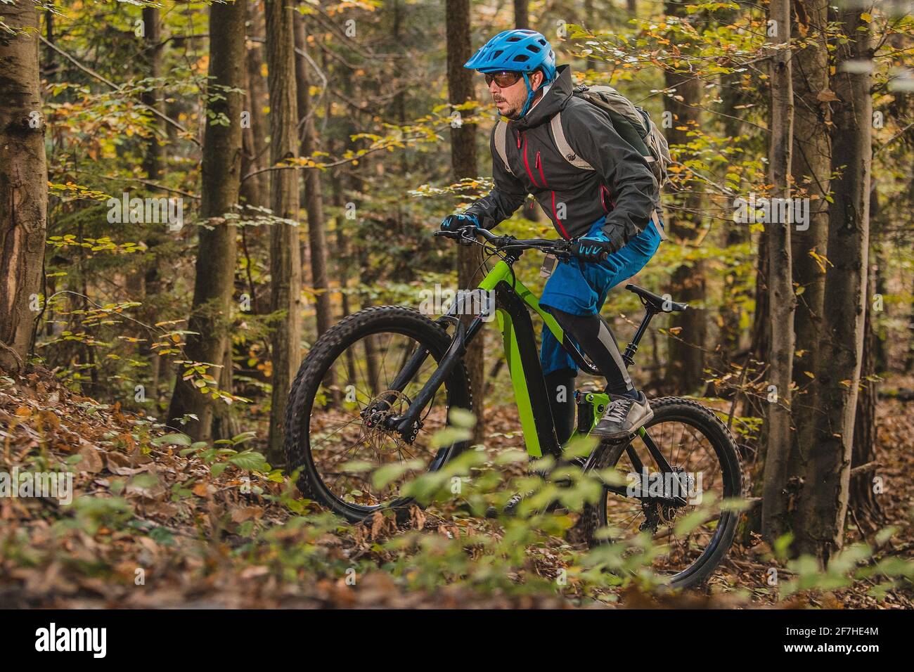 Modern man riding bike hi-res stock photography and images - Alamy