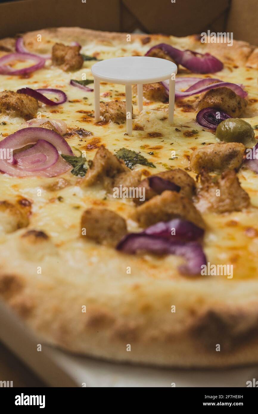 Pizza saver or ottoman, known also as pizza table, used in pizza ...