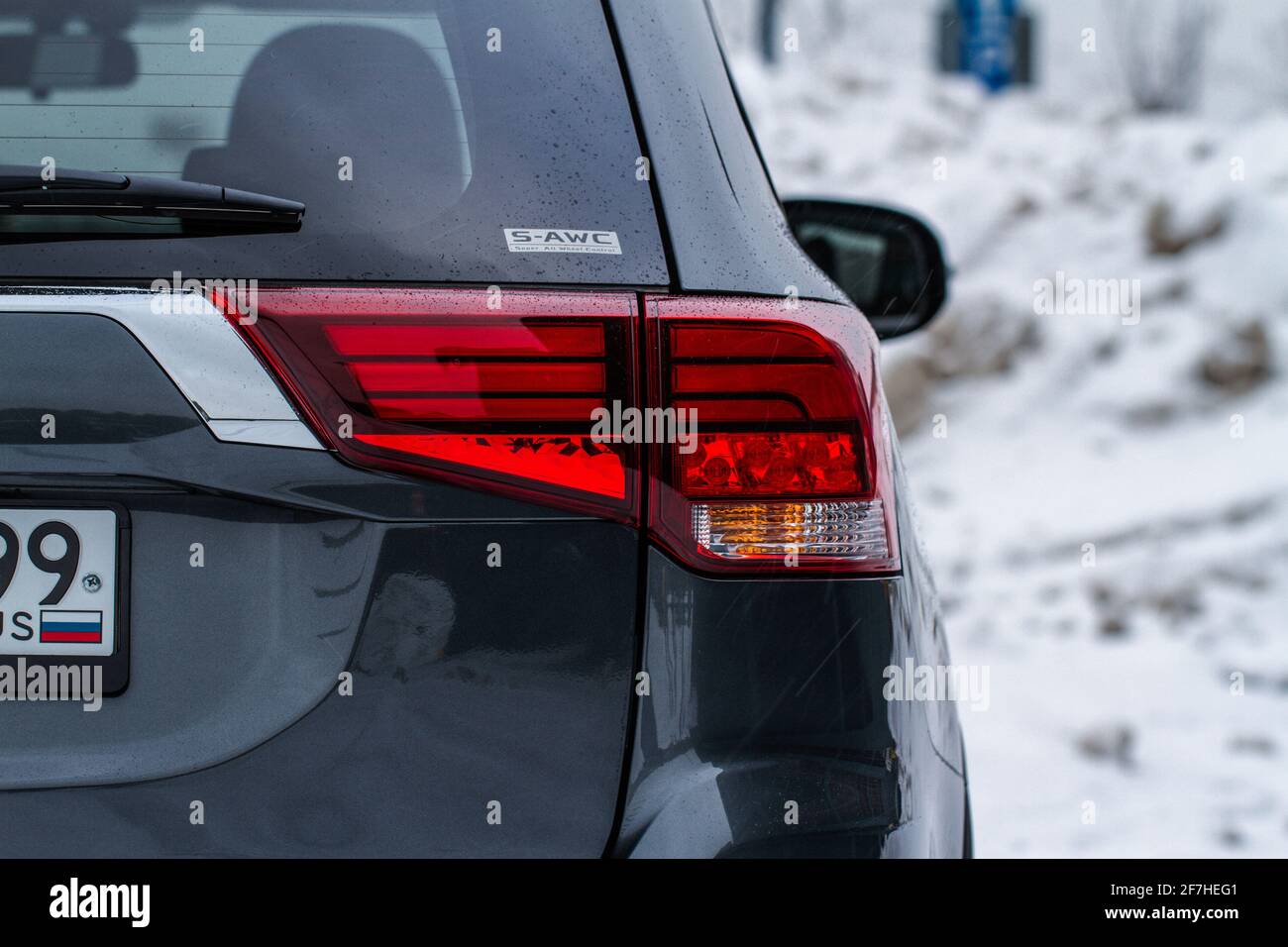 MOSCOW, RUSSIA - JANUARY 30, 2021 Mitsubishi Outlander rear light close ...