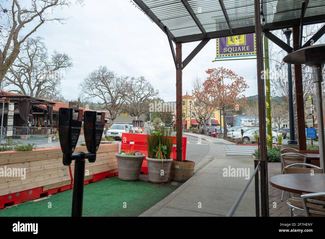 Photograph of a busy street taken from an outdoor seating area at La ...