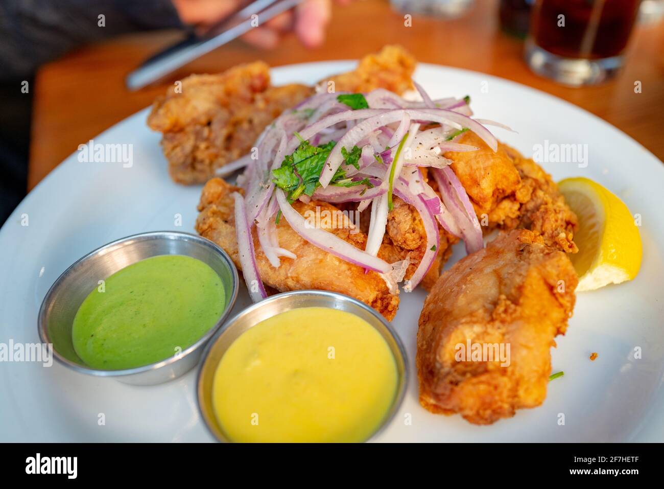 Close-up of the Peruvian dish pollo a la brasa, or rotisserie chicken ...