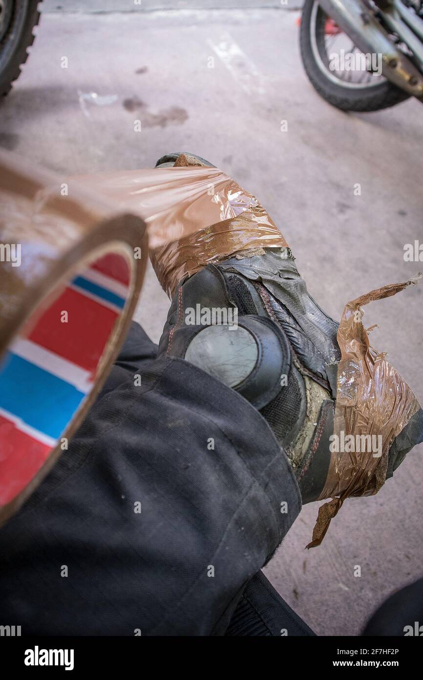 Leather boots repair hi-res stock photography and images - Alamy