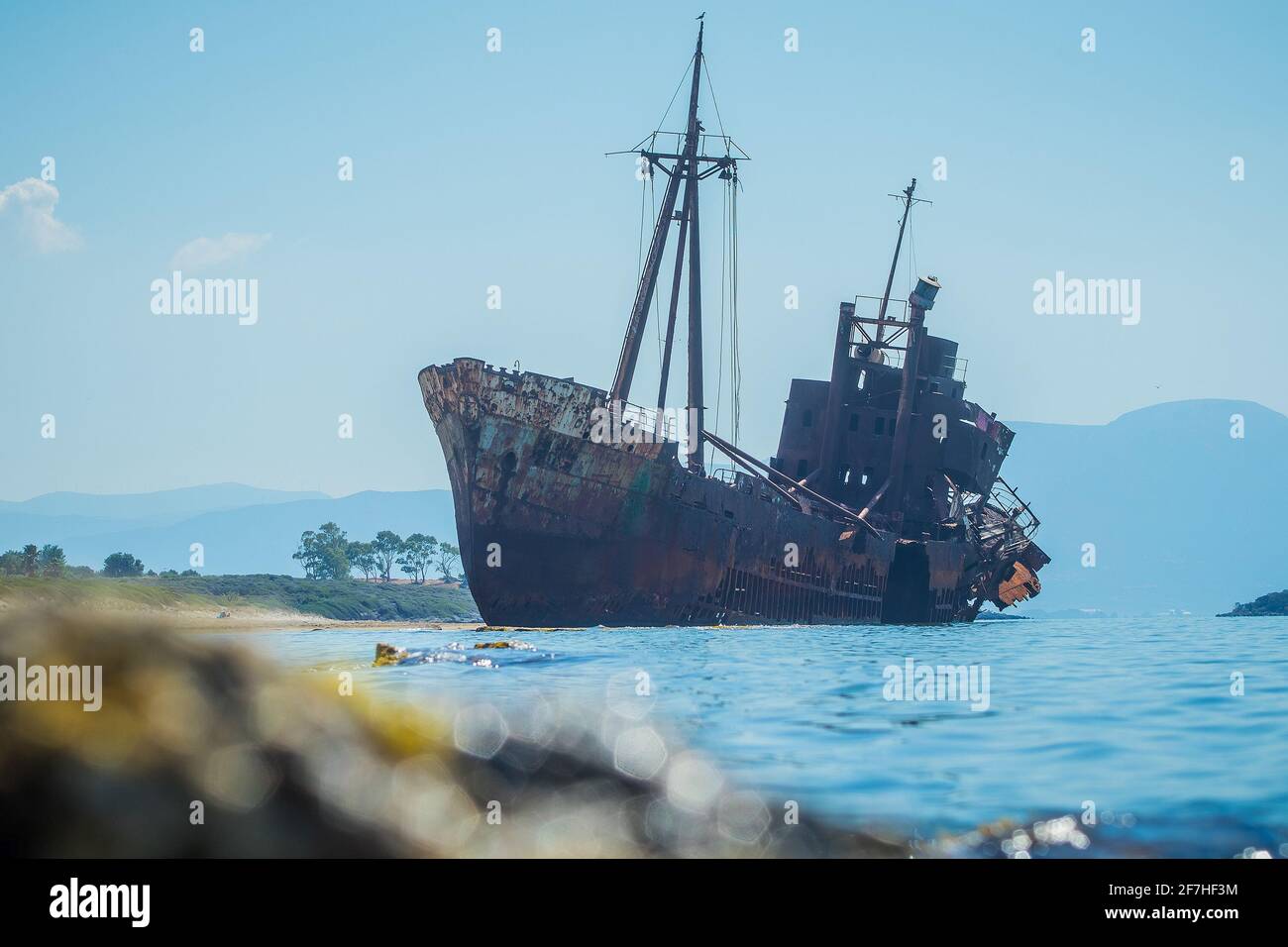 Dimitrios shipwreck in Gythio, Greece. A partially sunk rusty metal ...