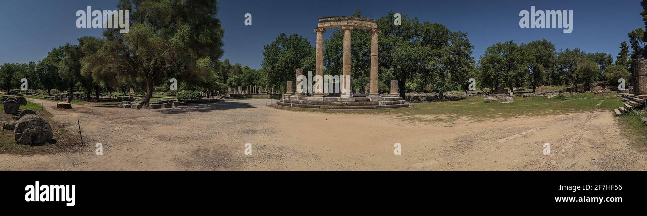Vertical panorama of archeological ruins consisting of diffrent columns ...