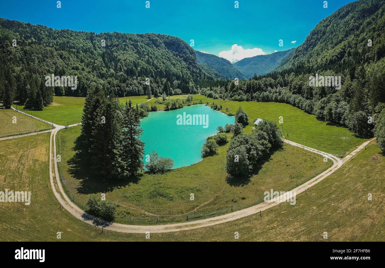 Aerial panorama of beautiful alpine lake Kreda in the centre of Radovna ...