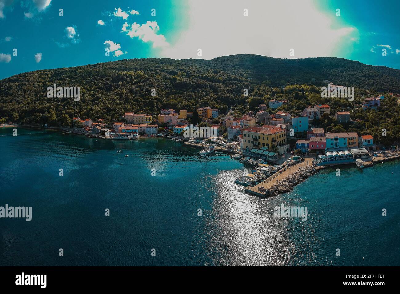 Small boats in the harbour of valun hi-res stock photography and images ...