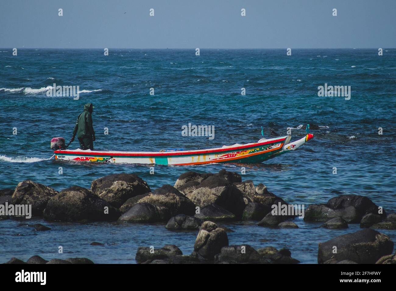 Typical fishing boat in Almadies, Dakar, Senegal, called pirogue or ...