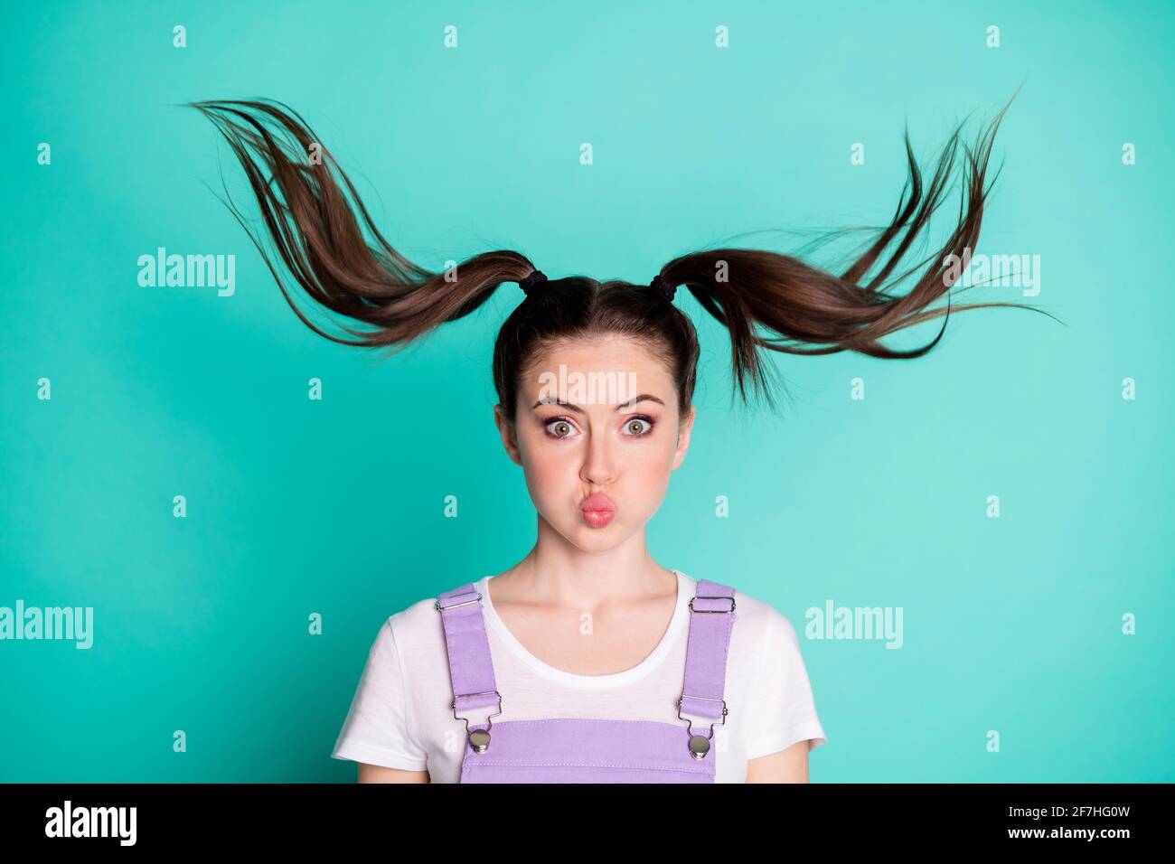 Puffed cheeks woman hi-res stock photography and images - Alamy