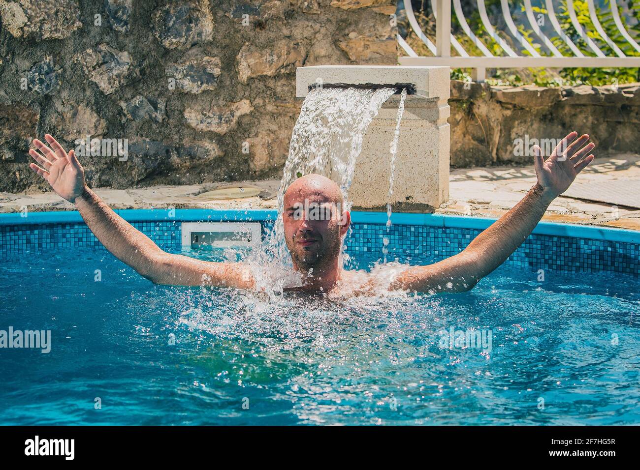 Bald man swimming hi-res stock photography and images - Alamy