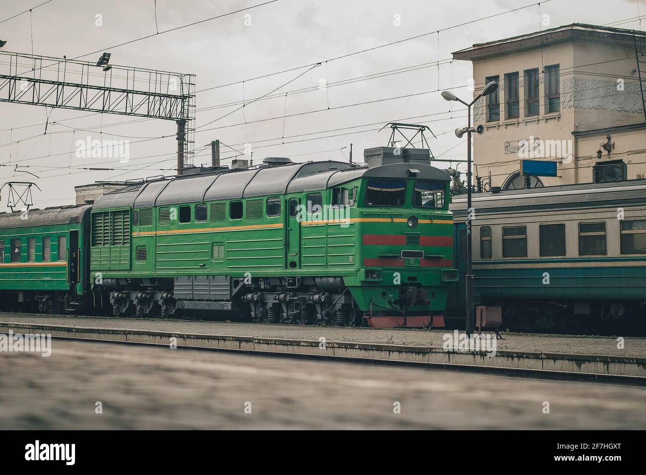 Ukrainian passenger train on the station of Zhmerynka during a small ...
