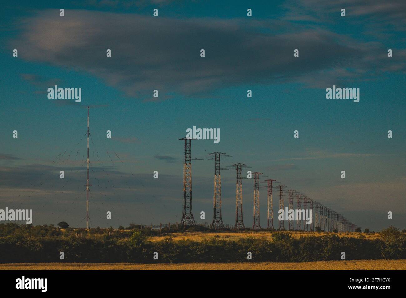 Pylons field evening hi-res stock photography and images - Alamy