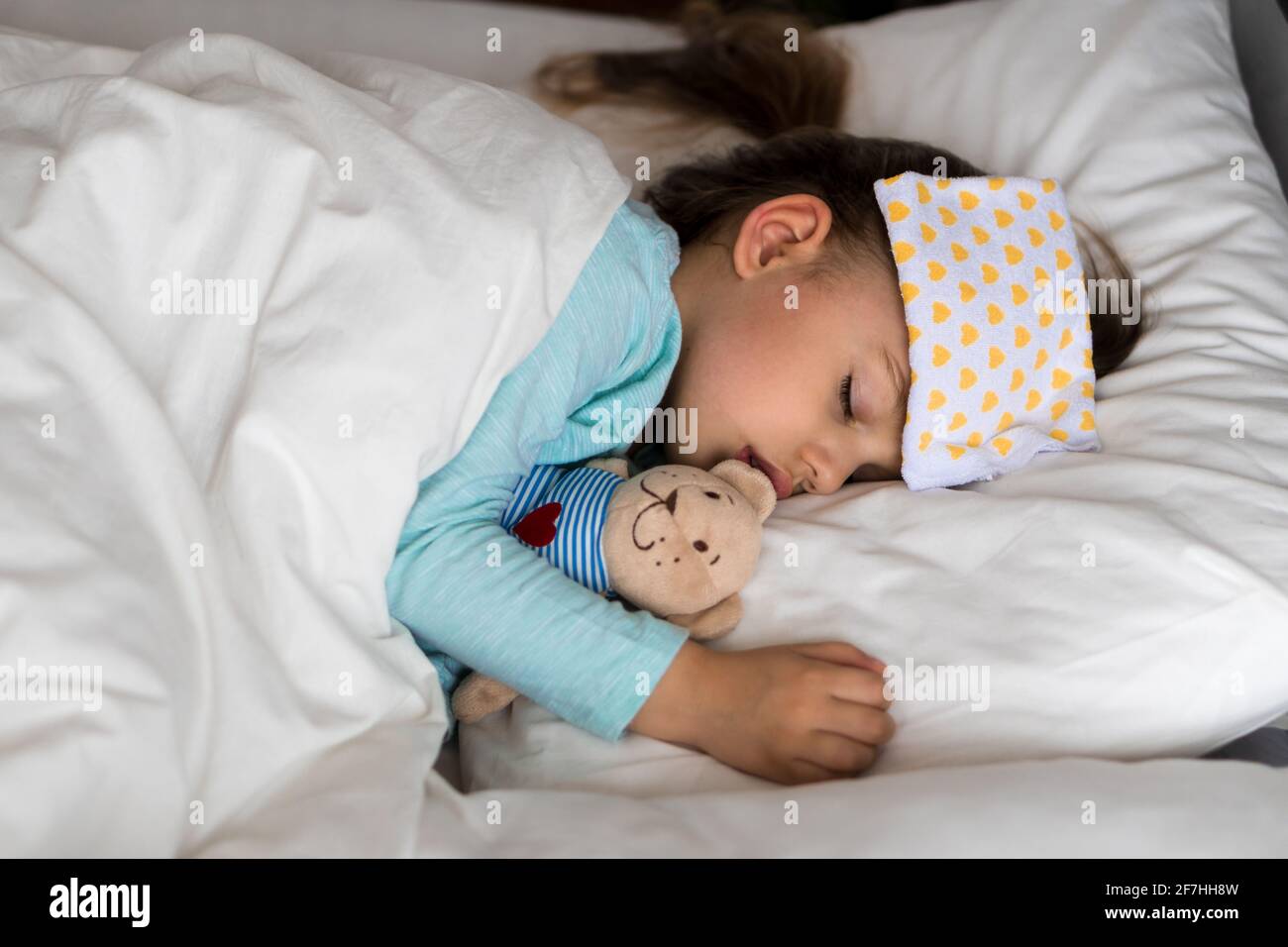 Authentic portrait sick cute caucasian little preschool baby girl in ...