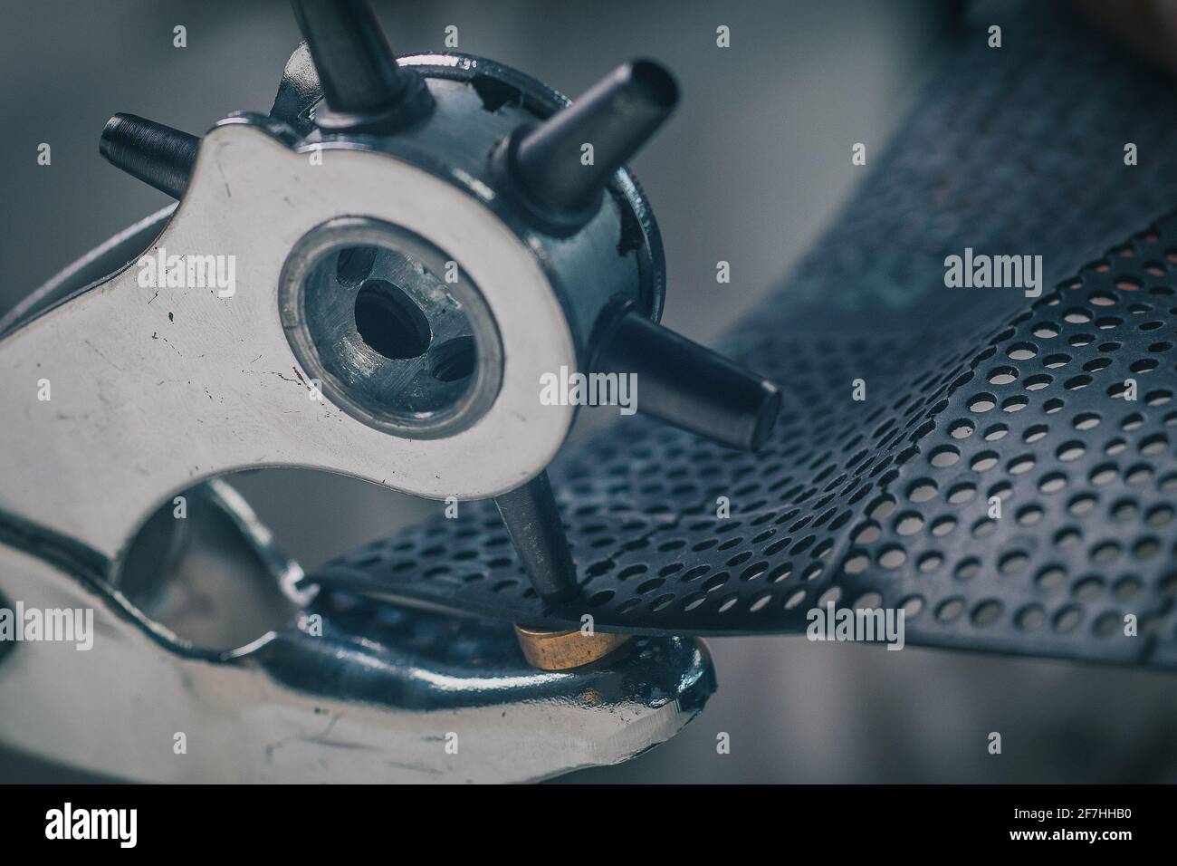 Close detail view of a revolving head of centre punch or holer ...