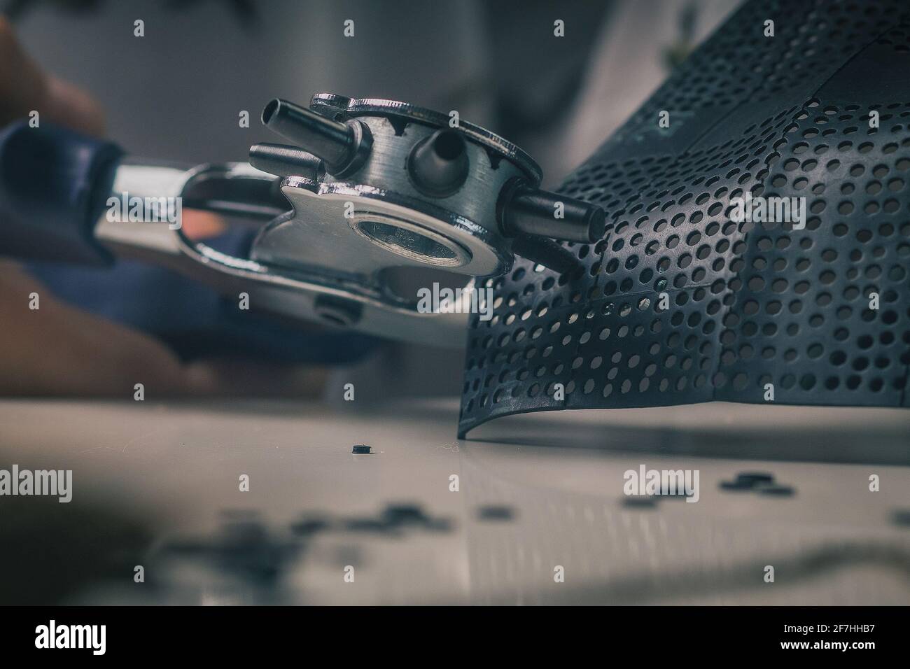 Close detail view of a revolving head of centre punch or holer ...