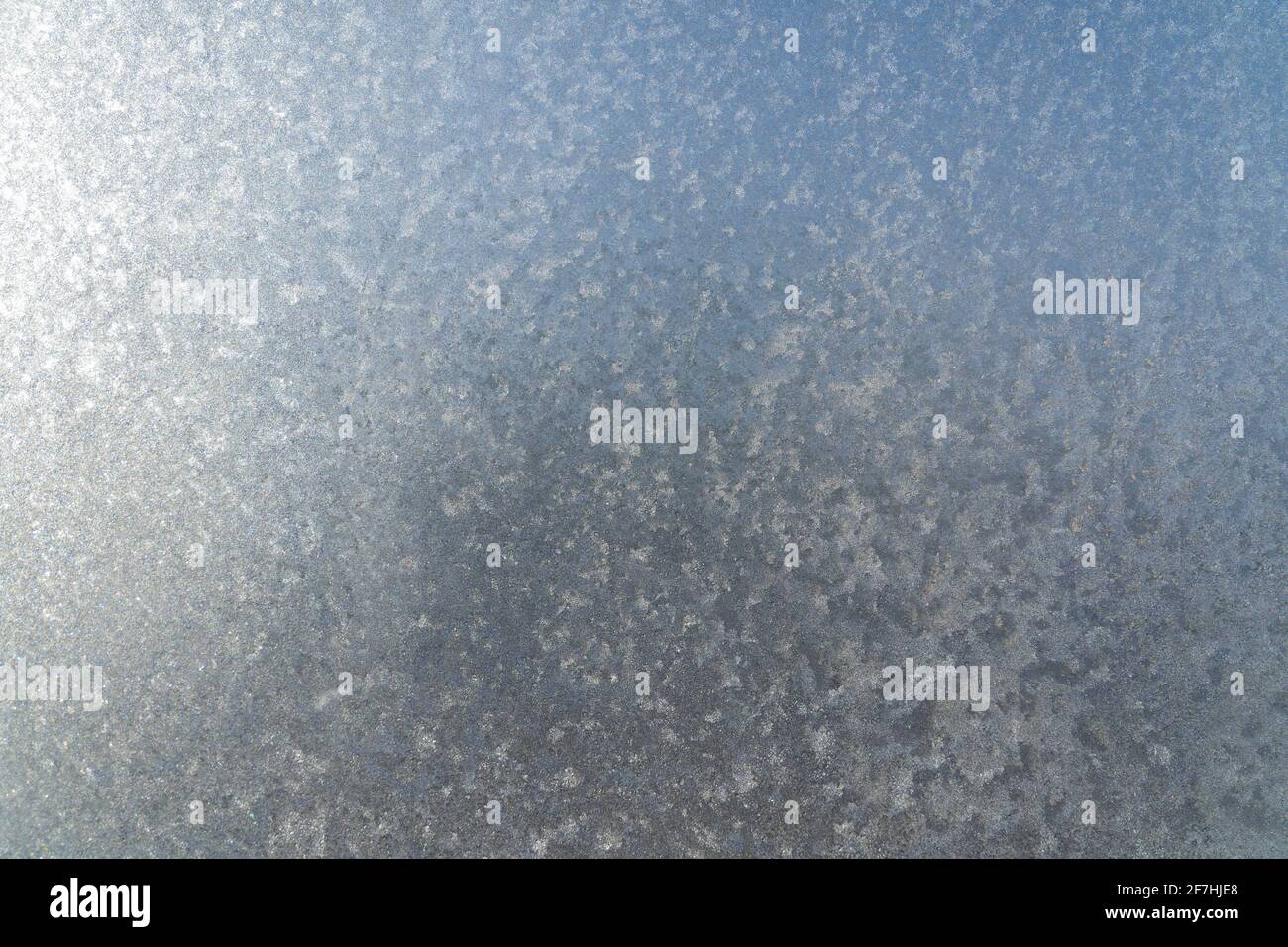 Frozen window glass covered with frost on a winter day Stock Photo - Alamy