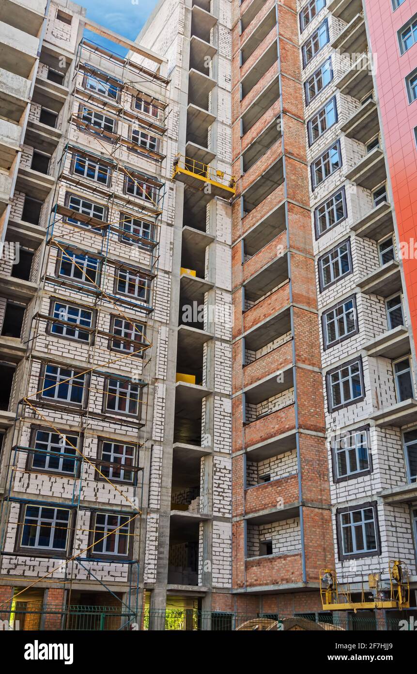 Walls of multi-storey building under construction at the stage ...