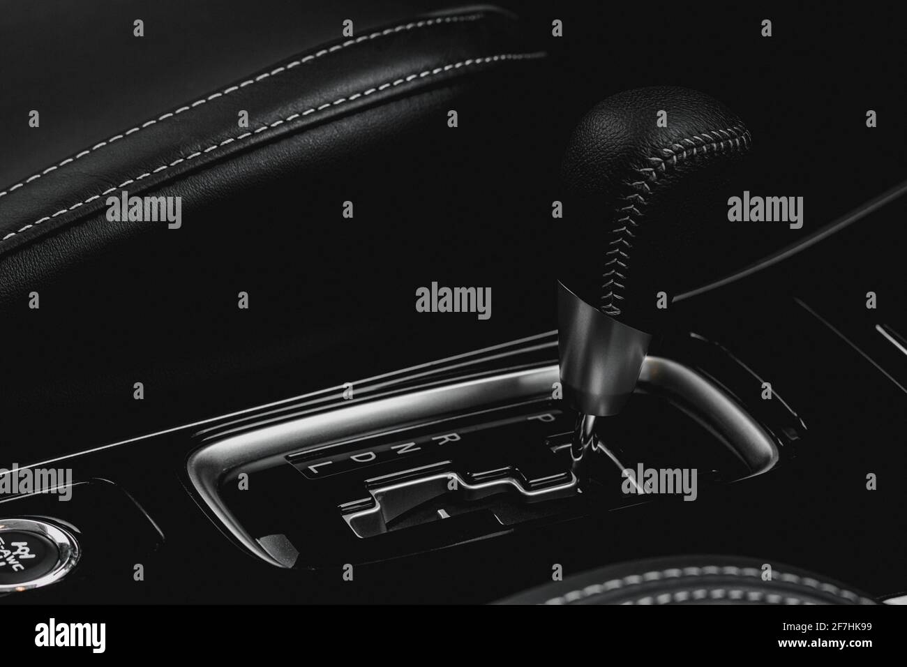 Close up of the automatic gearbox lever. Gear shift handle in a modern ...