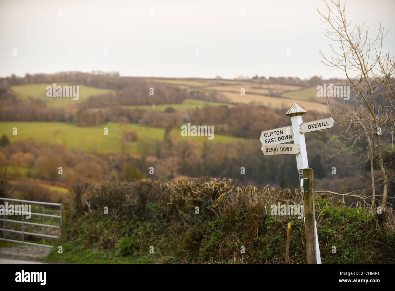 Wooden directional road sign to give directions in the countryside ...
