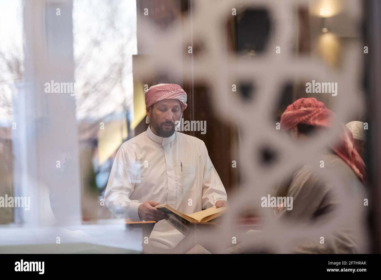 muslim people in mosque reading quran together Stock Photo - Alamy