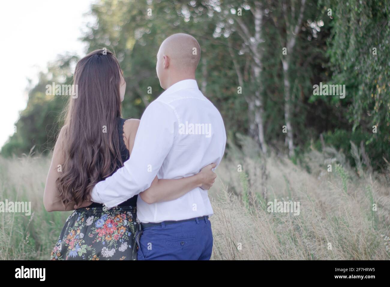 happy couple in love. husband and wife. brunette and bald man in the ...