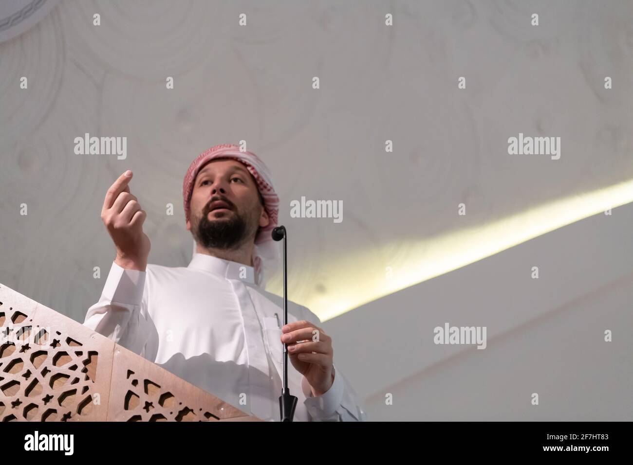 Muslims young arabic Imam has a speech on friday afternoon prayer in ...