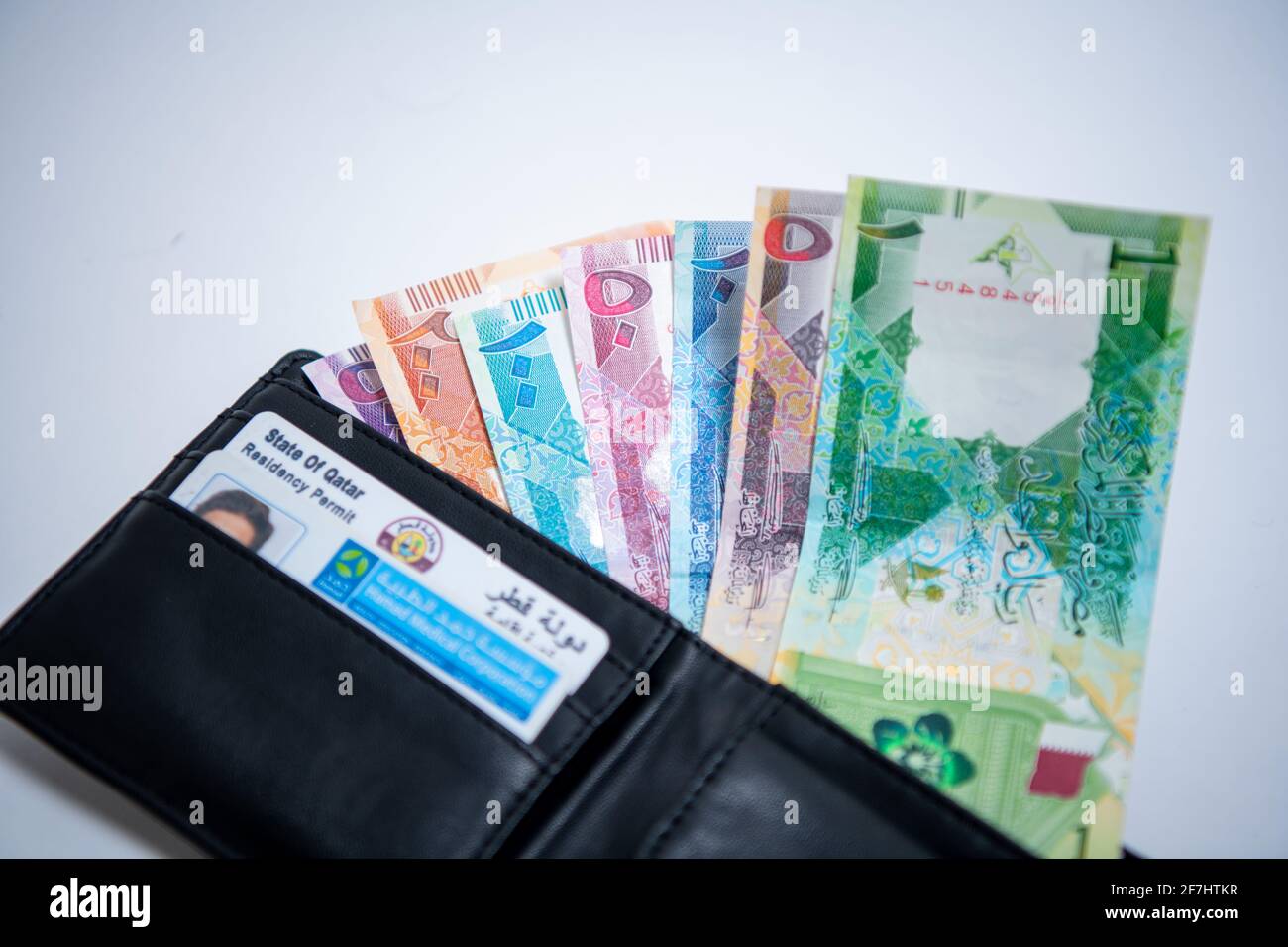 New money Qatar Bank notes in the wallet on isolated background Stock ...