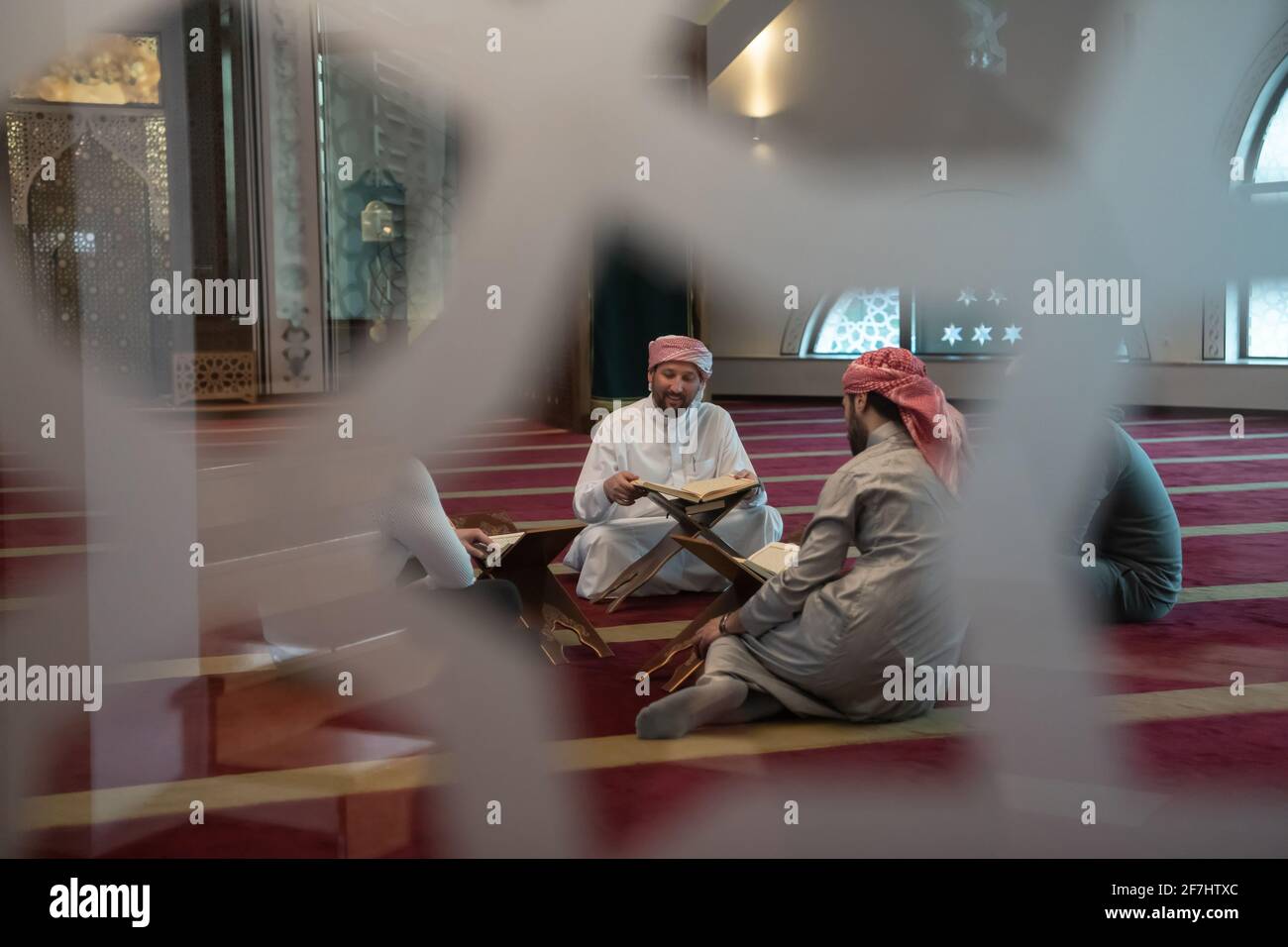 muslim people in mosque reading quran together Stock Photo - Alamy
