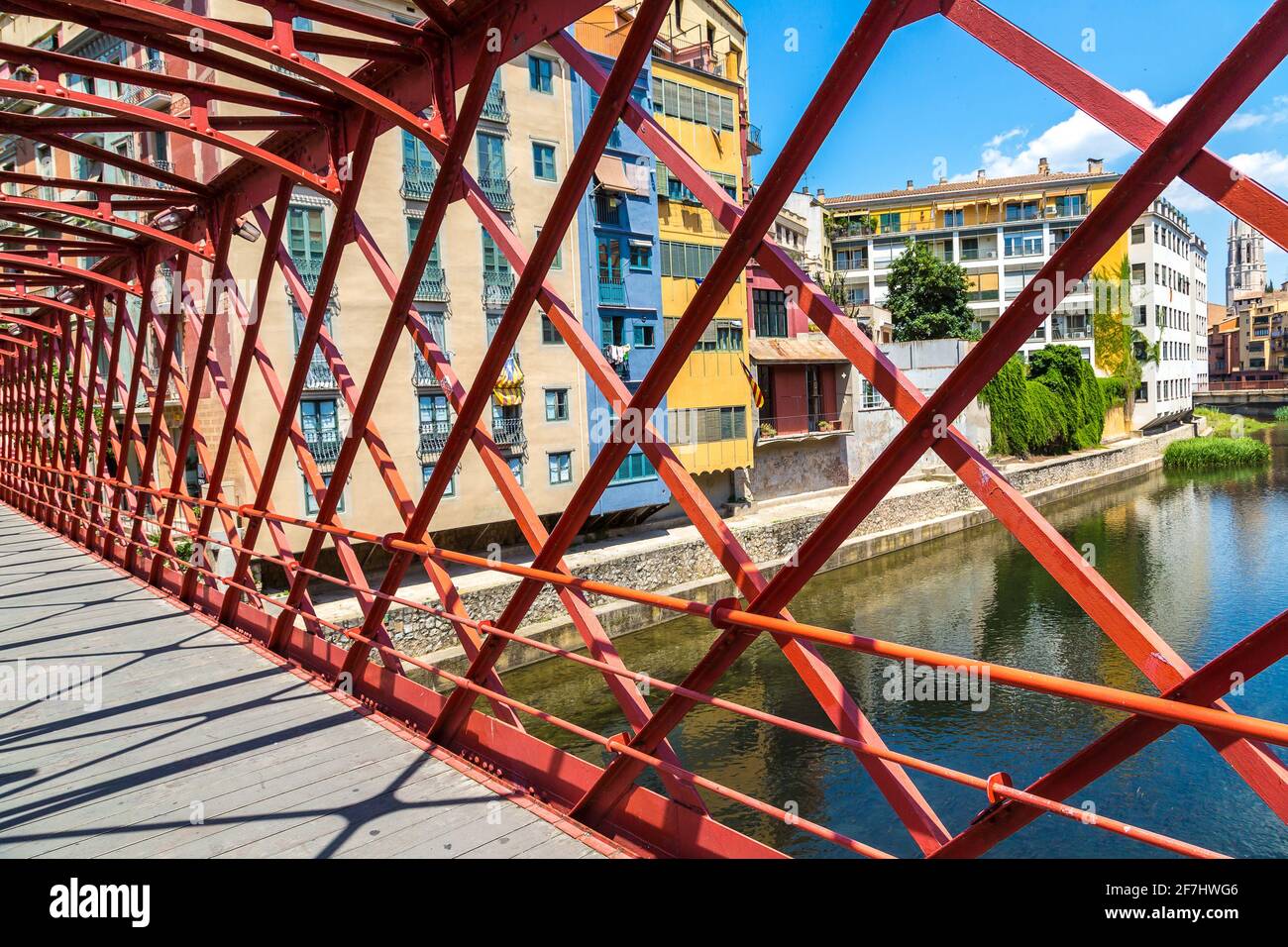 Red iron bridge - Eiffel bridge in Girona, in a beautiful summer day ...