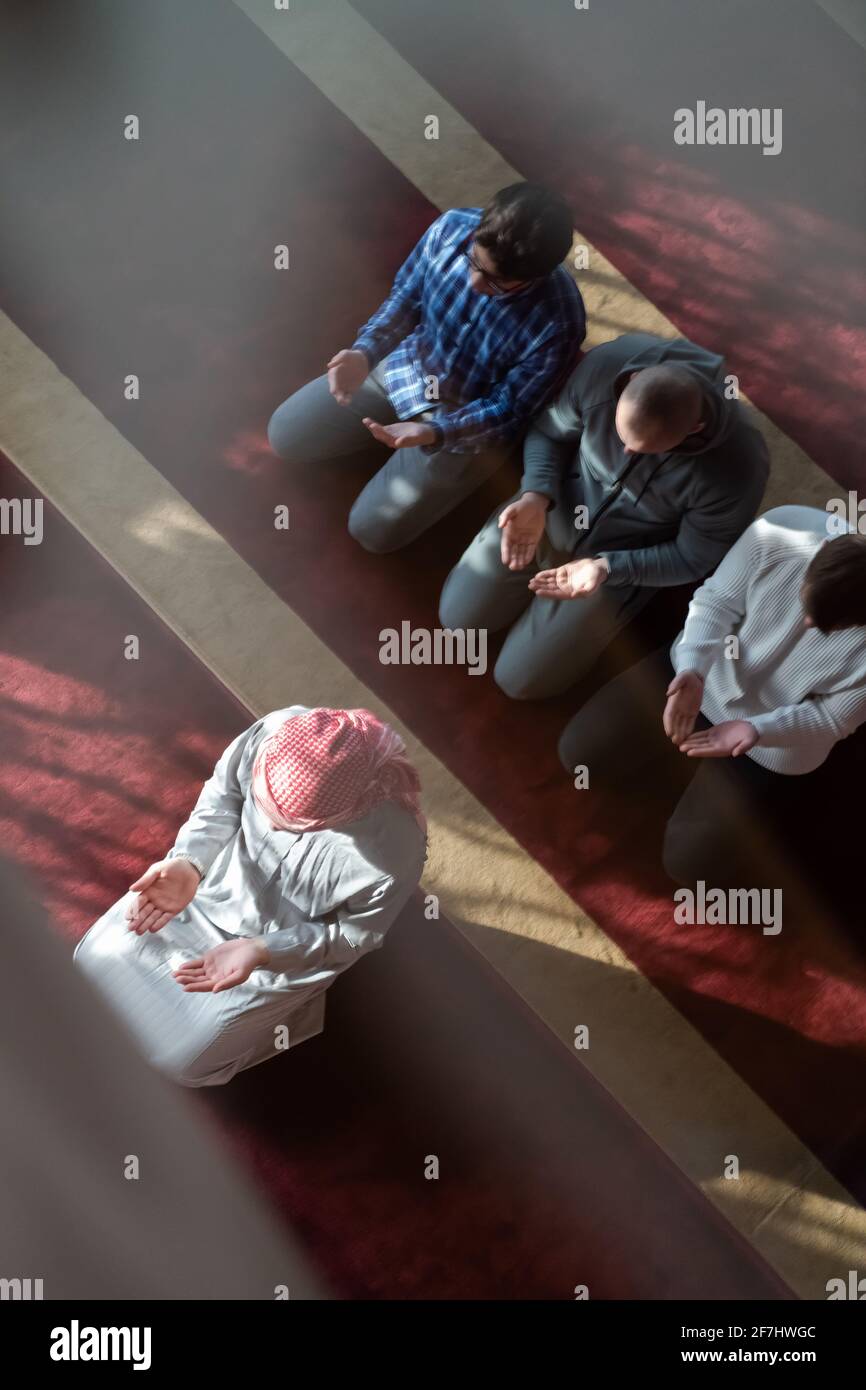group of muslim people praying namaz in mosque Stock Photo - Alamy